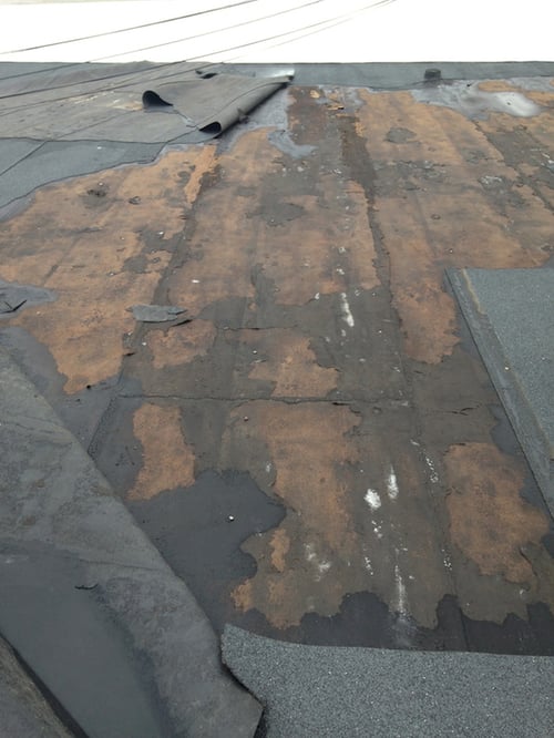 Addressing Wind Damage For Flat Commercial Roofs